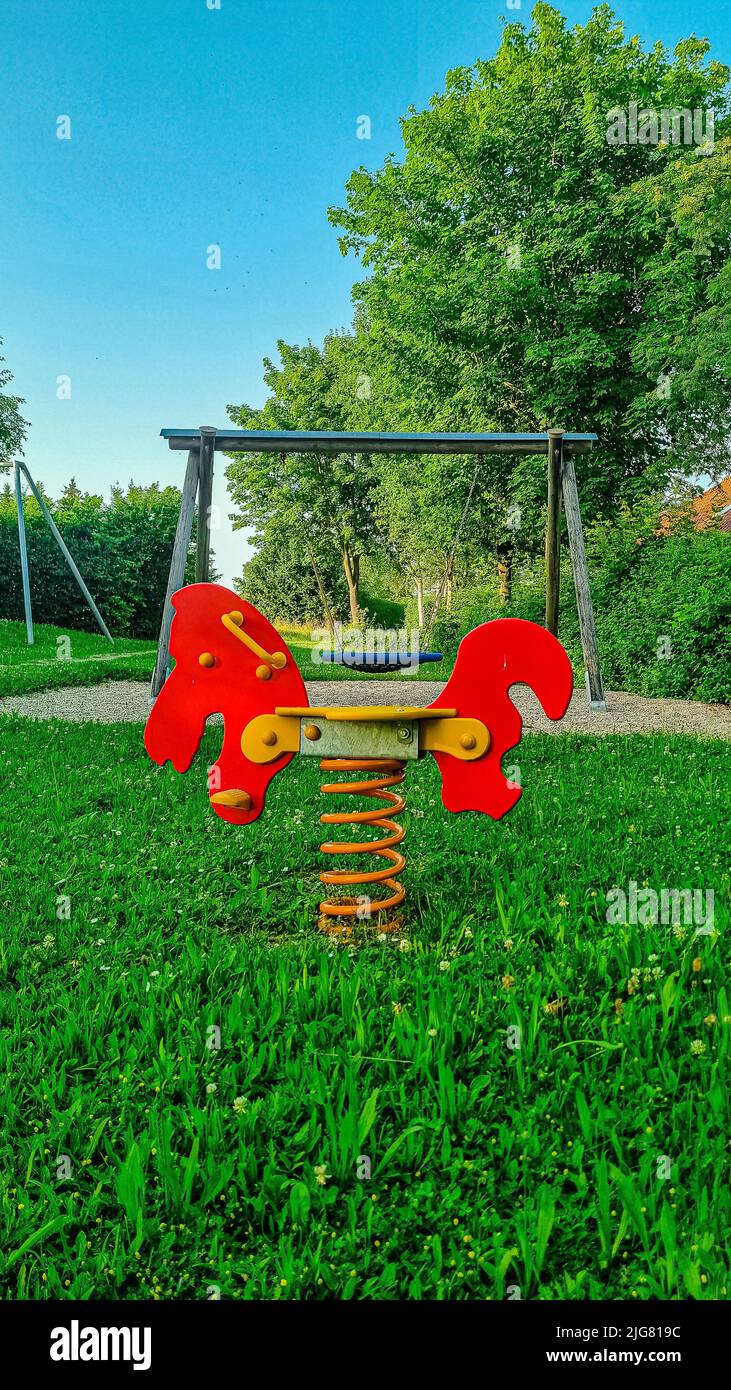 Childrens Playground with Horse and Swing in Lower Bavaria Germany Stock Photo - Alamy