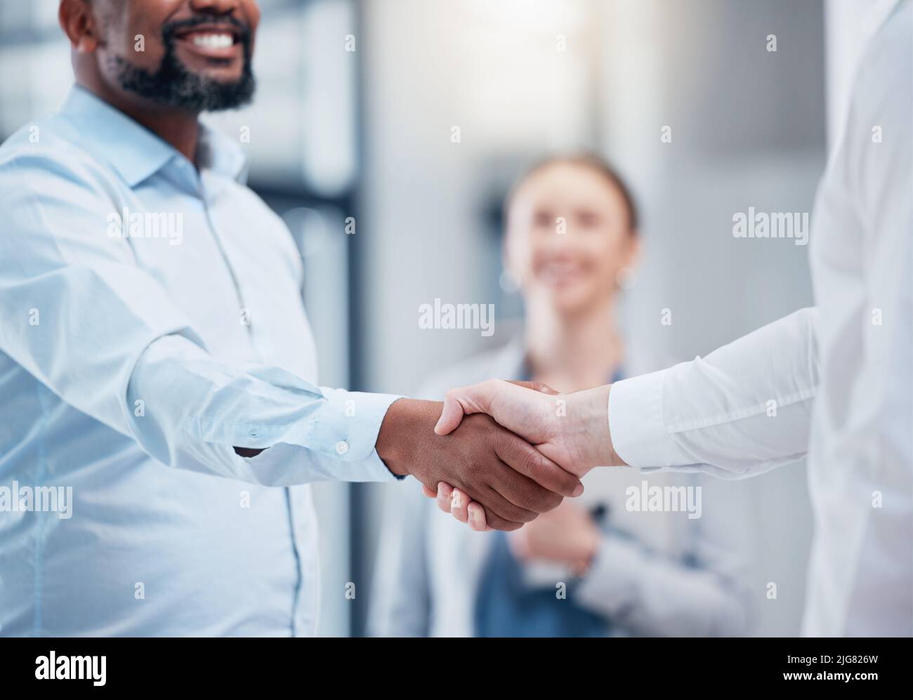 Hes got a firm handshake. Shot of two unrecognizable businesspeople ...