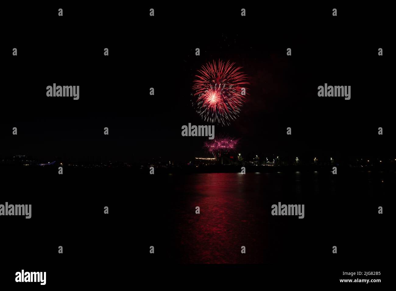 Fireworks shoot off over water of Alamitos Bay in Long Beach, CA to ...