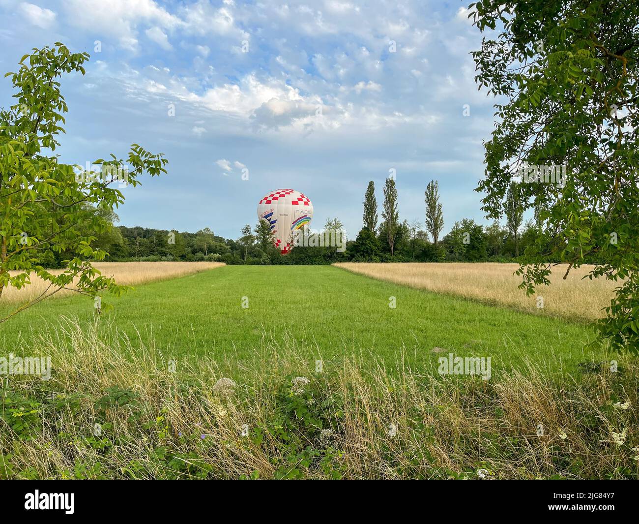 A hot air balloon on the ground just before take off Stock Photo - Alamy