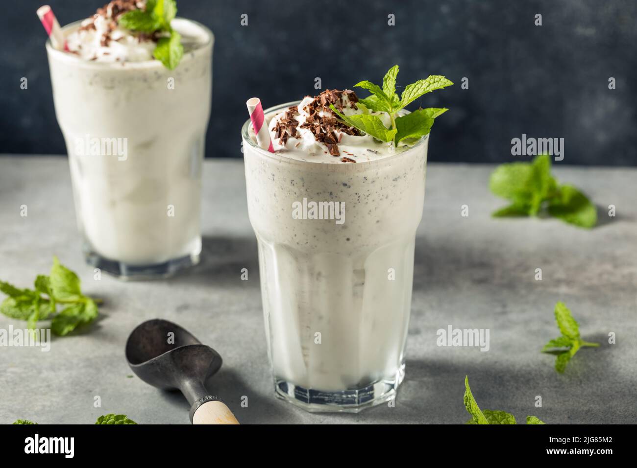 Homemade Green Chocolate Chip Mint Milkshake in a Glass Stock Photo - Alamy
