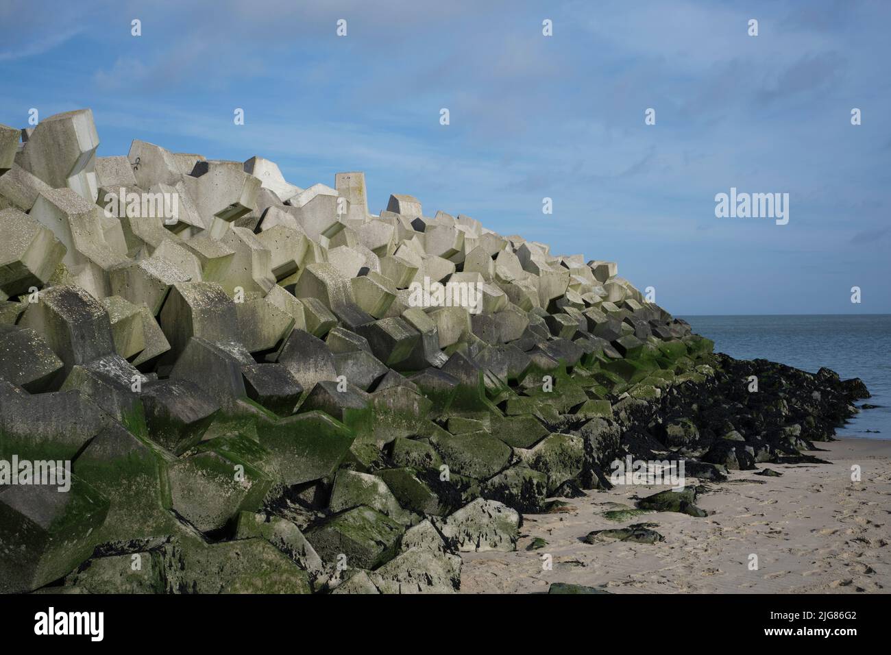 Dutch dike by the North Sea made of concrete stones, Netherlands Stock ...
