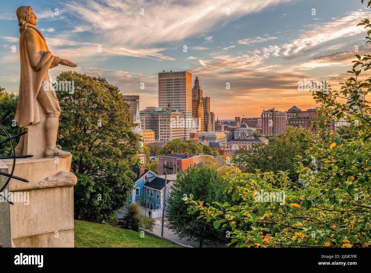 A Roger Williams statue and a Providence cityscape, Rhode Island, USA ...