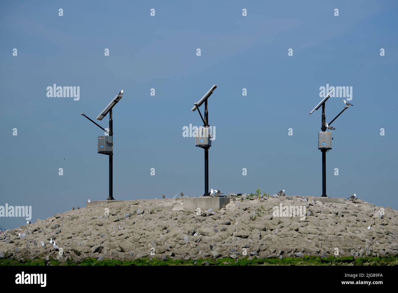 Concrete pier and lighthouse pole, port navigation equipment Stock ...