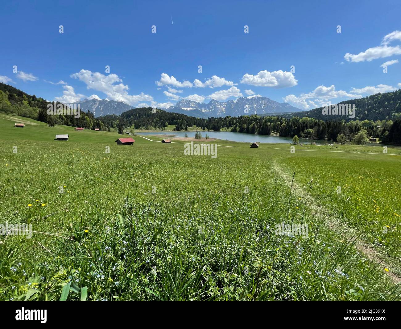 View over meadows to Geroldsee and Karwendel mountains, nature ...