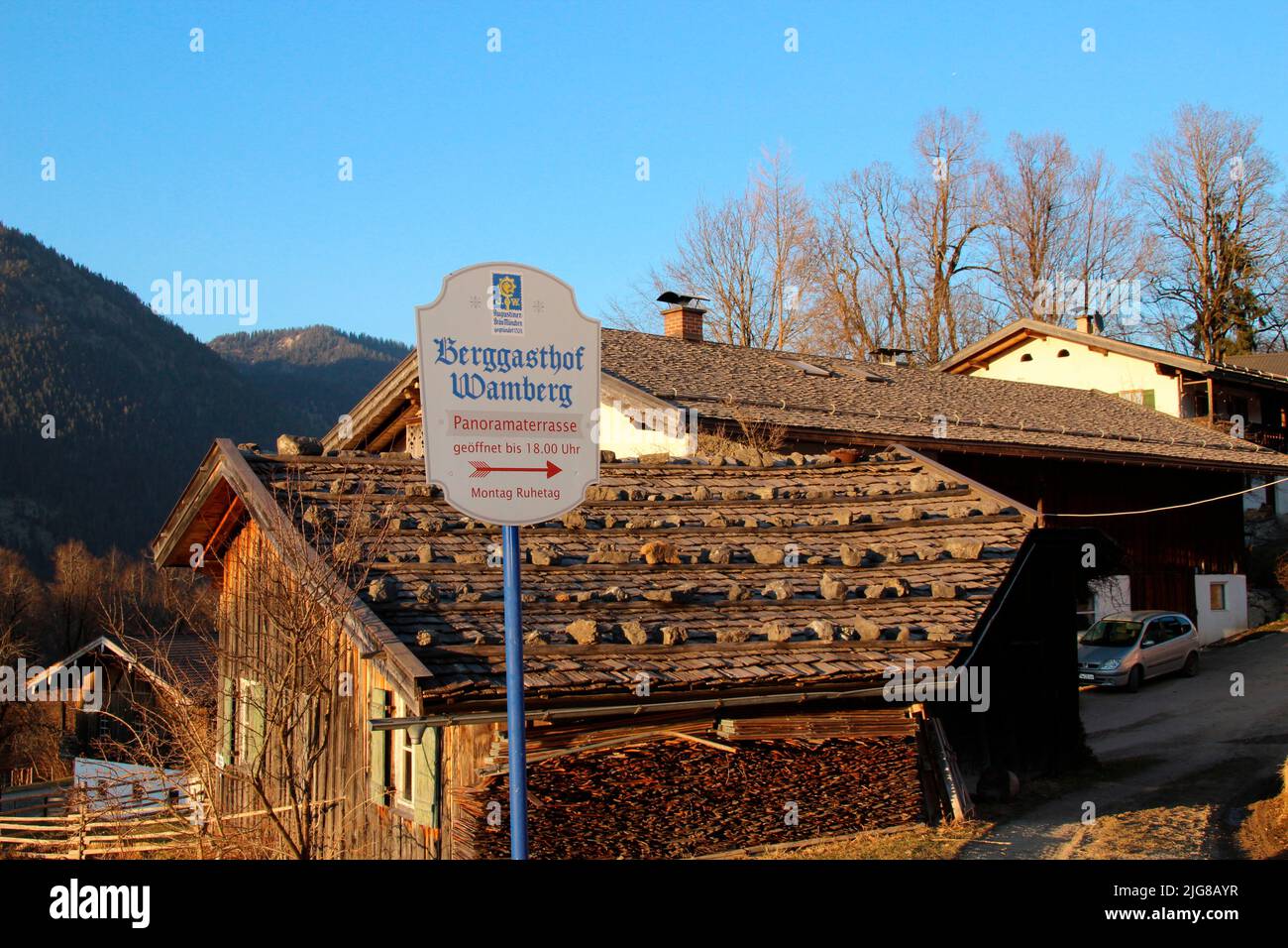Sunset in Wamberg, district of Garmisch-Partenkirchen, sign inn ...