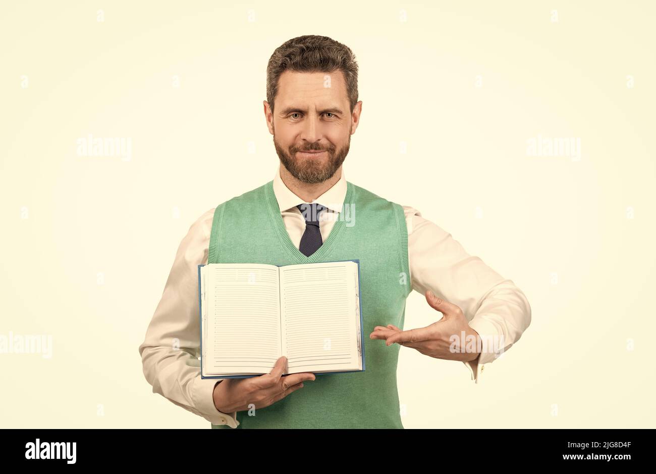 man showing notebook isolated on white background, erudition Stock ...