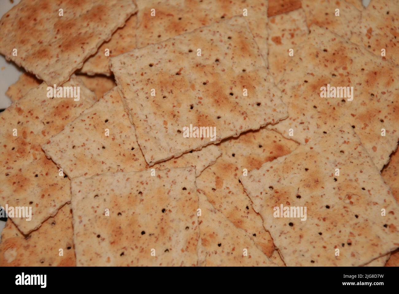 A closeup of crispy crackers in square shape Stock Photo - Alamy