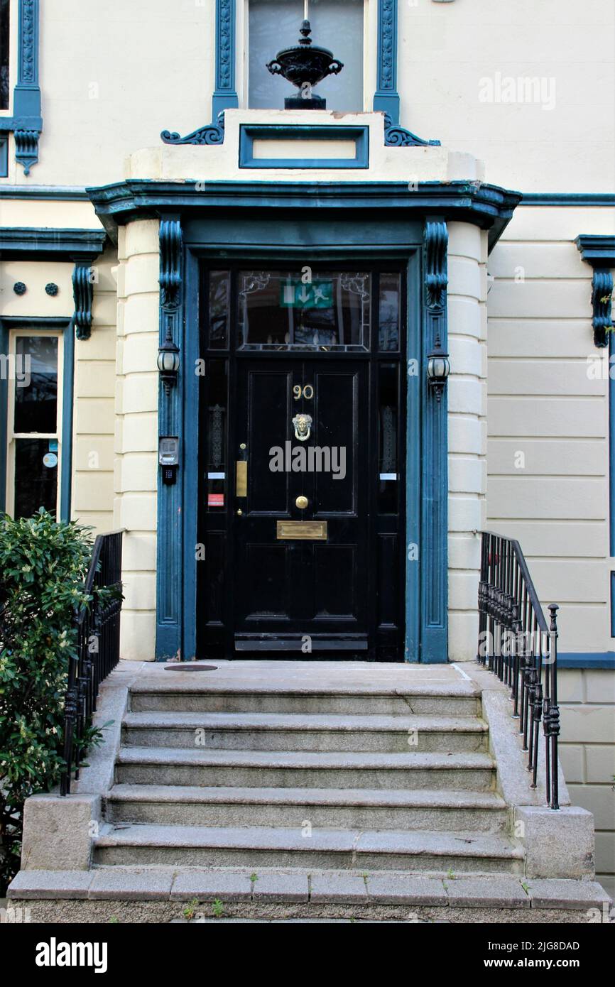house facades in Dún Laoghaire in Ireland, - blue door on a house ...