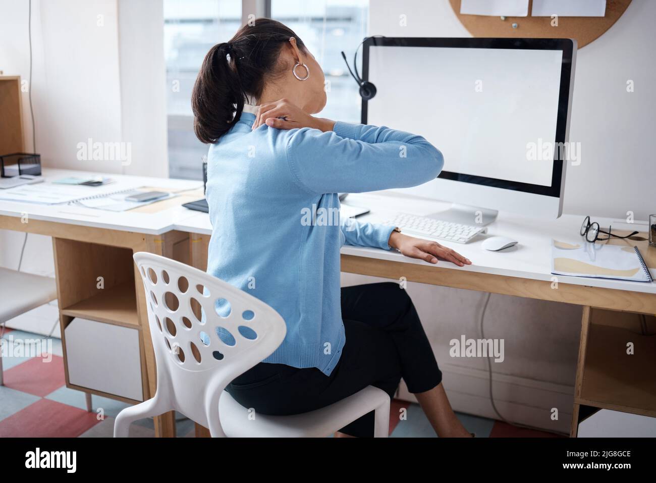 Woman back pain desk hi-res stock photography and images - Alamy