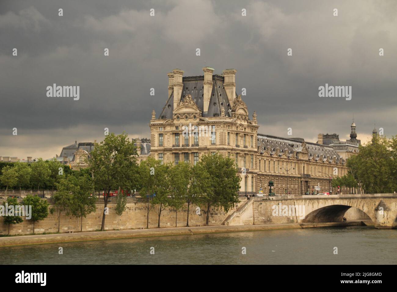 A beautiful shot of the Louvre Museum in the cloudy weather Stock Photo ...