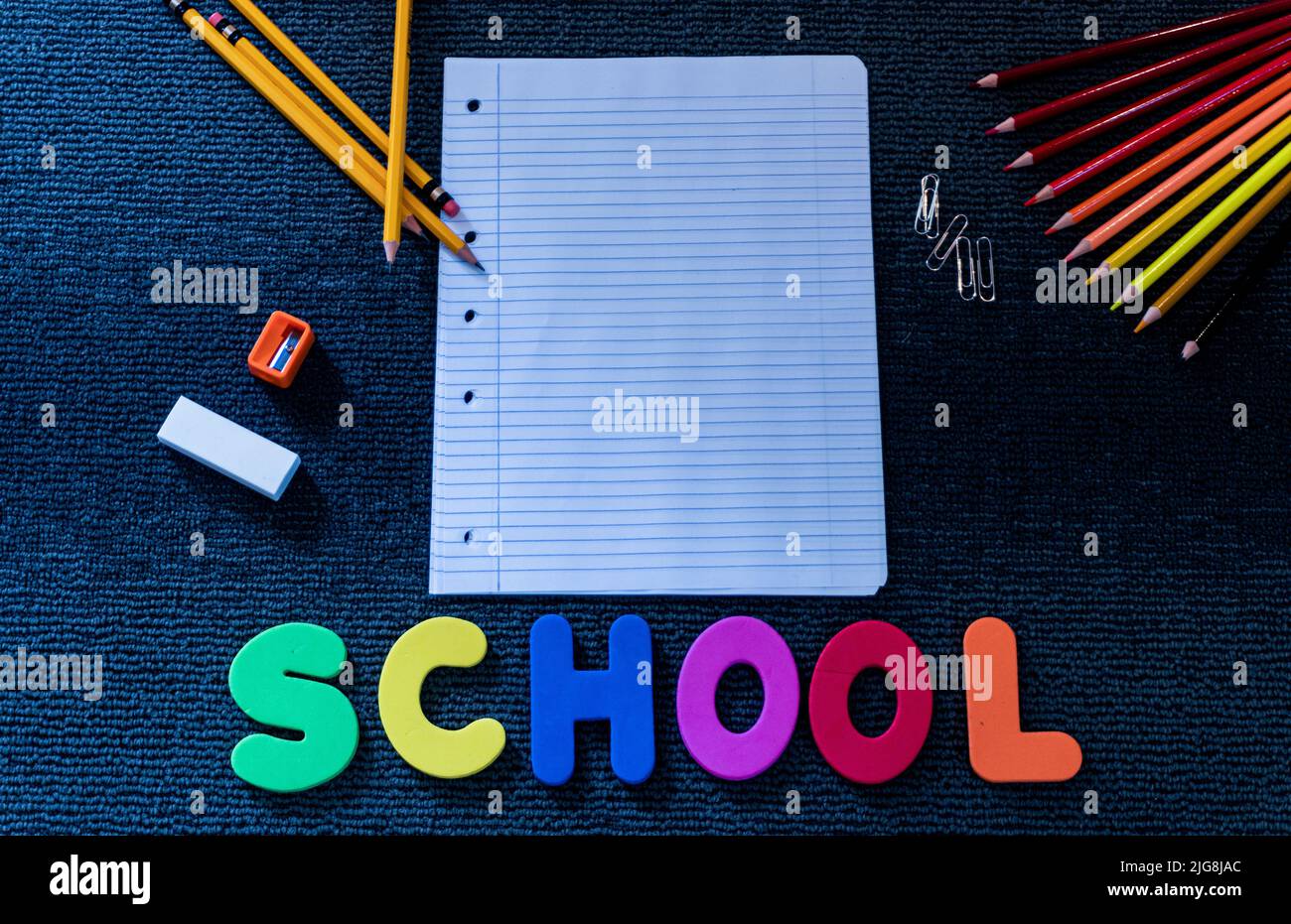 Various school supplies and colored letters sign: "School Stock Photo ...