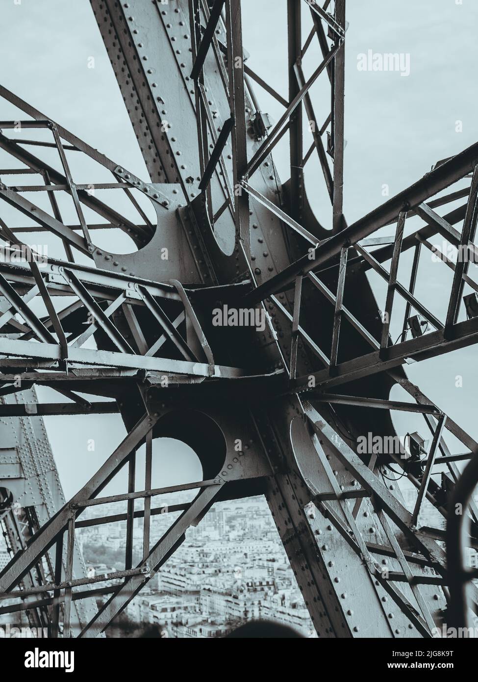 A grayscale low angle shot of the metal beam of Eiffel tower Stock ...
