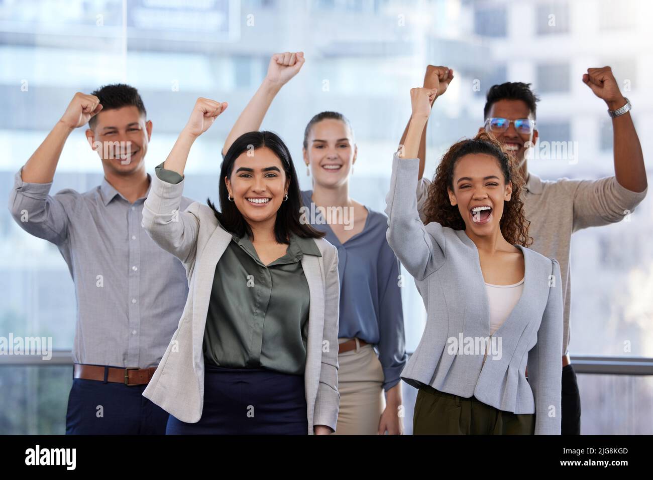 We outperformed, it paid off. Portrait of a group of young ...