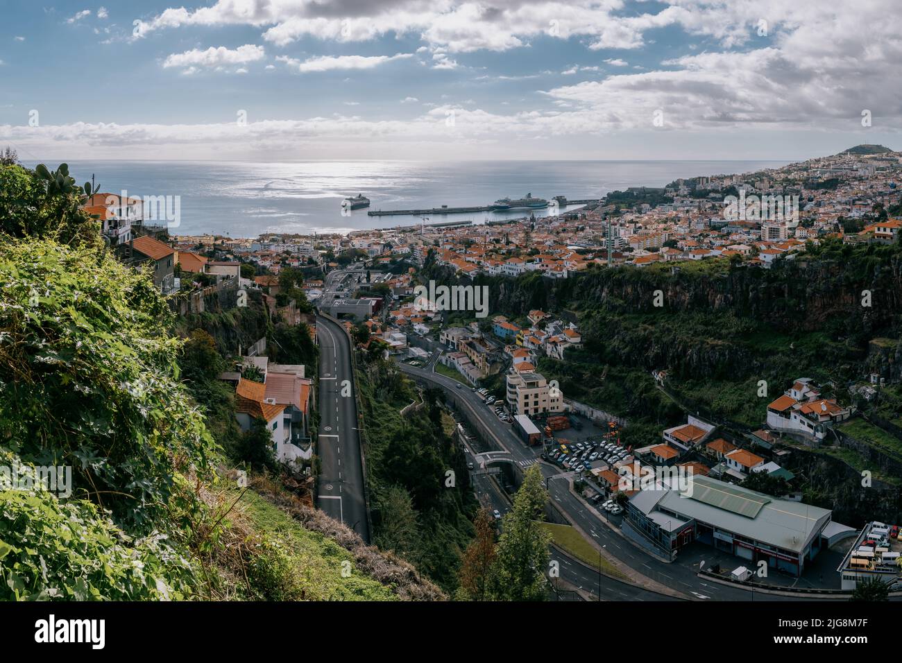An aerial view of a sunny sky over the city of Madeira on the Portugal ...