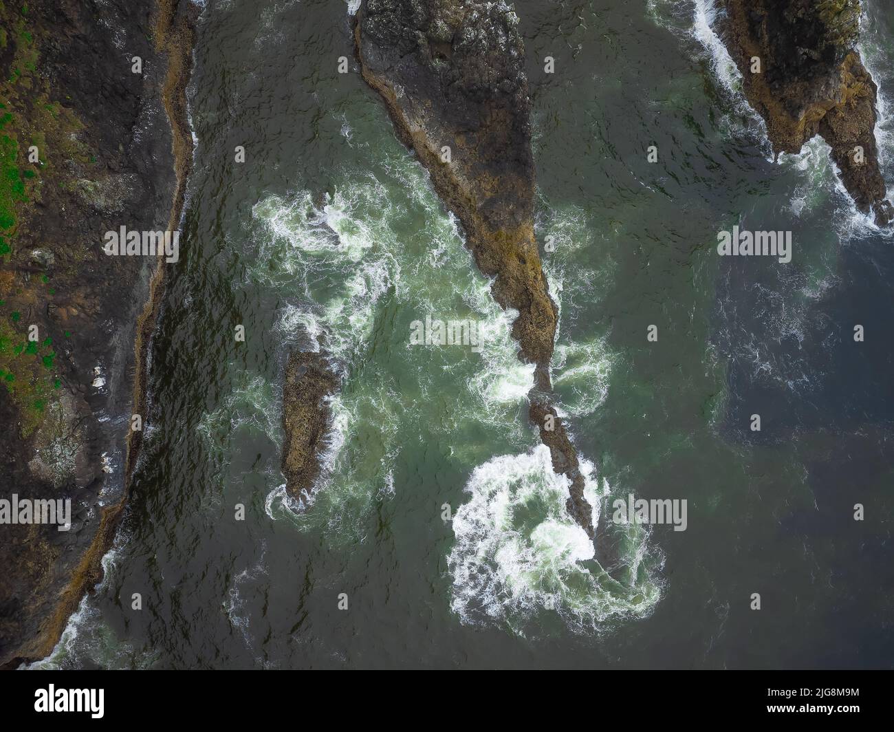 View from above. Large rocks, bizarre boulders in the ocean ...