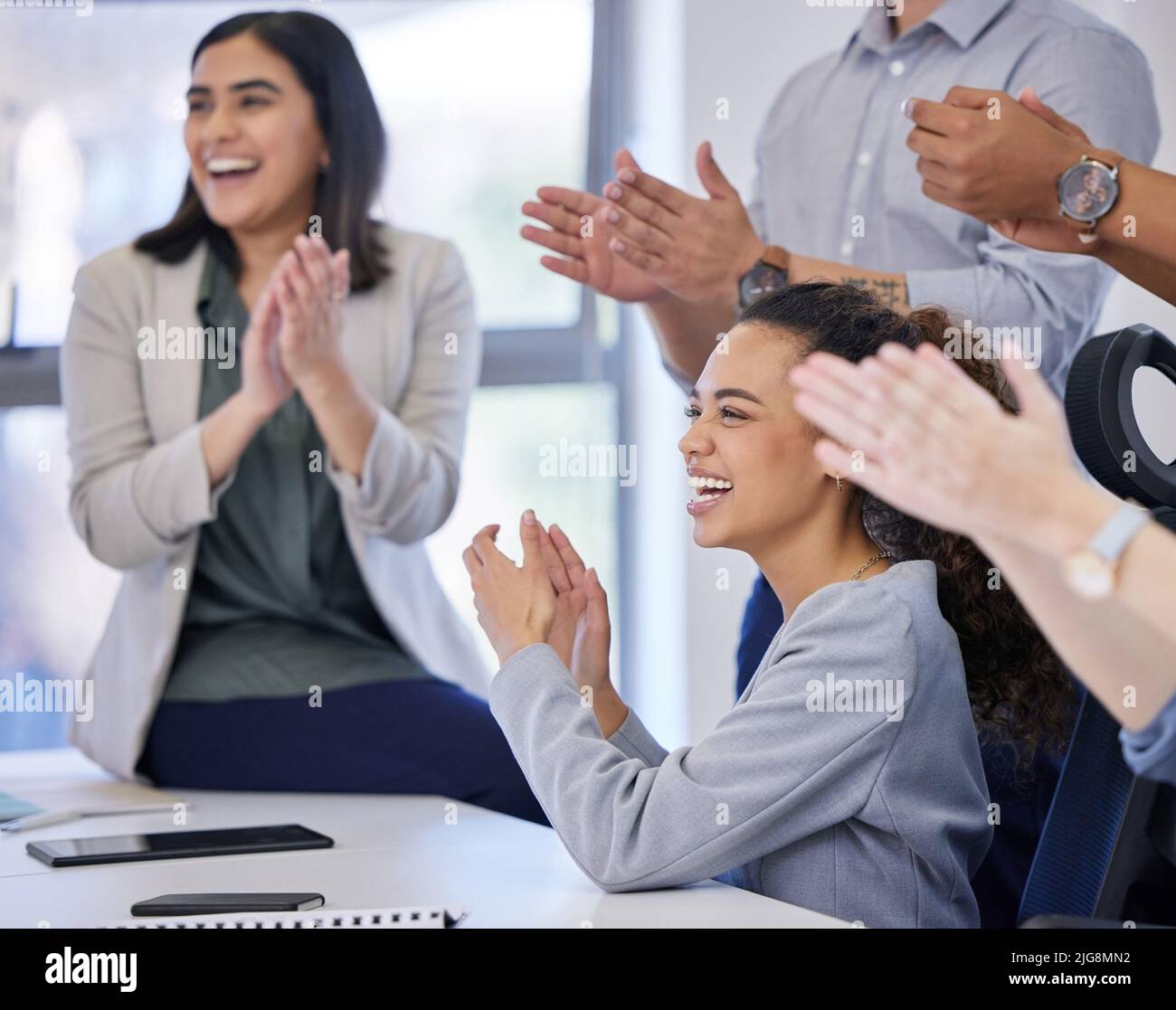 Positive thoughts create a positive environment. Shot of a group of ...