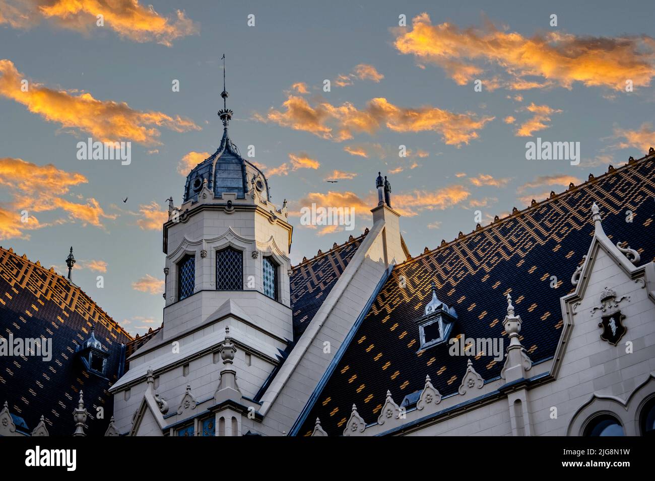 Low angle shot of a building dome with beautiful architecture at sunset ...