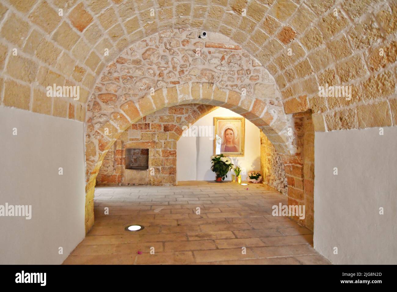 An alley in Specchia, a medieval village in the Puglia region of Italy ...