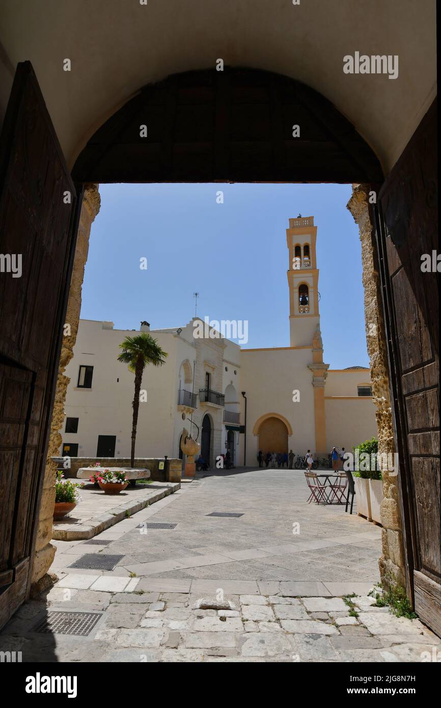An alley in Specchia, a medieval village in the Puglia region of Italy ...
