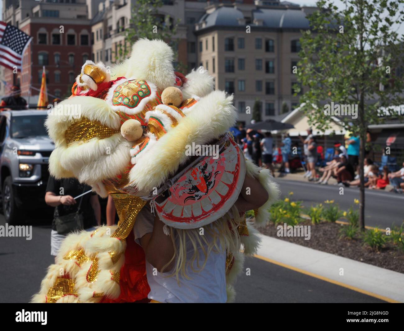 Chinese Dragon entertaining spectators in Parade. Selective focus and ...
