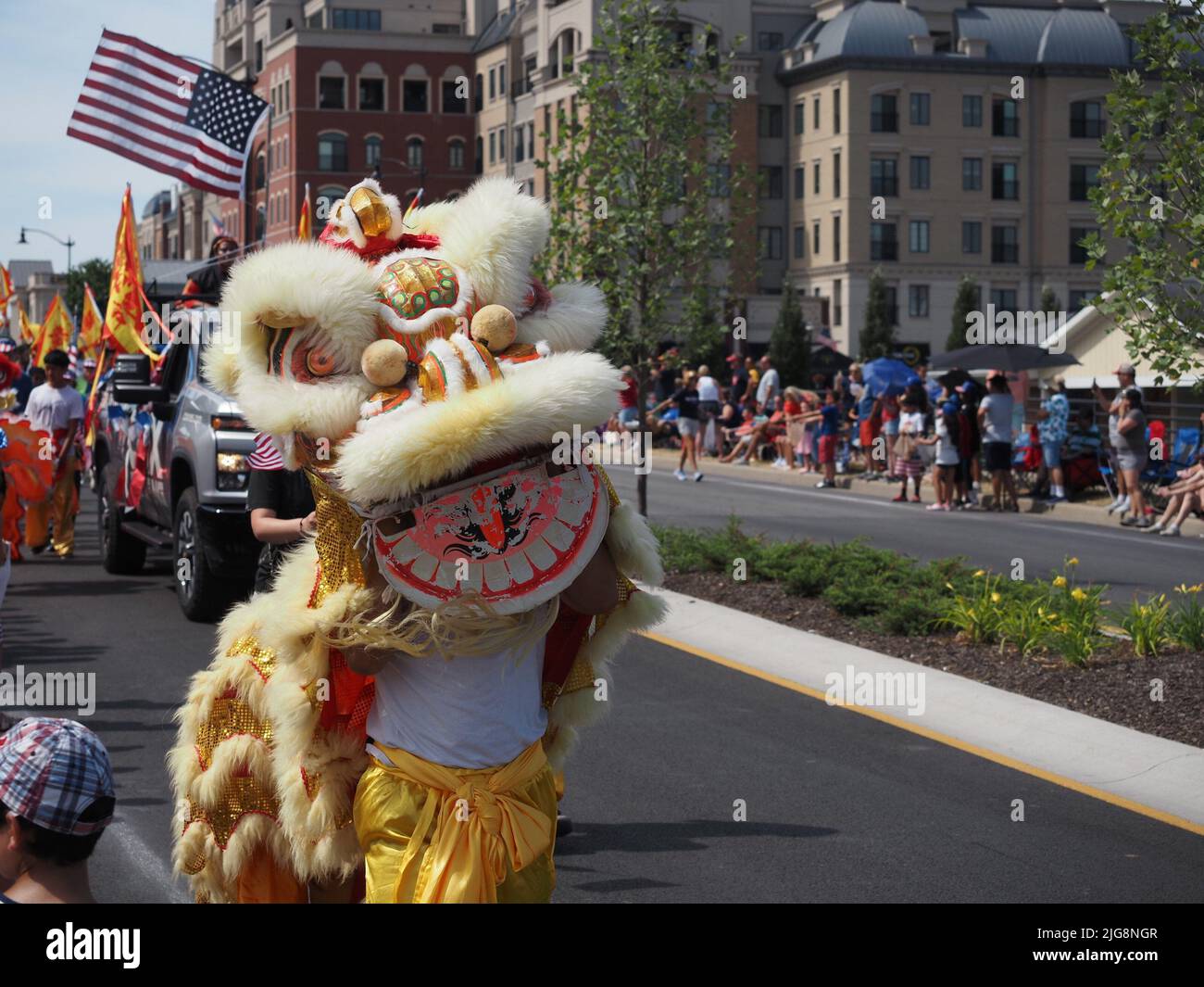 Chinese Dragon entertaining spectators in Parade. Selective focus and ...