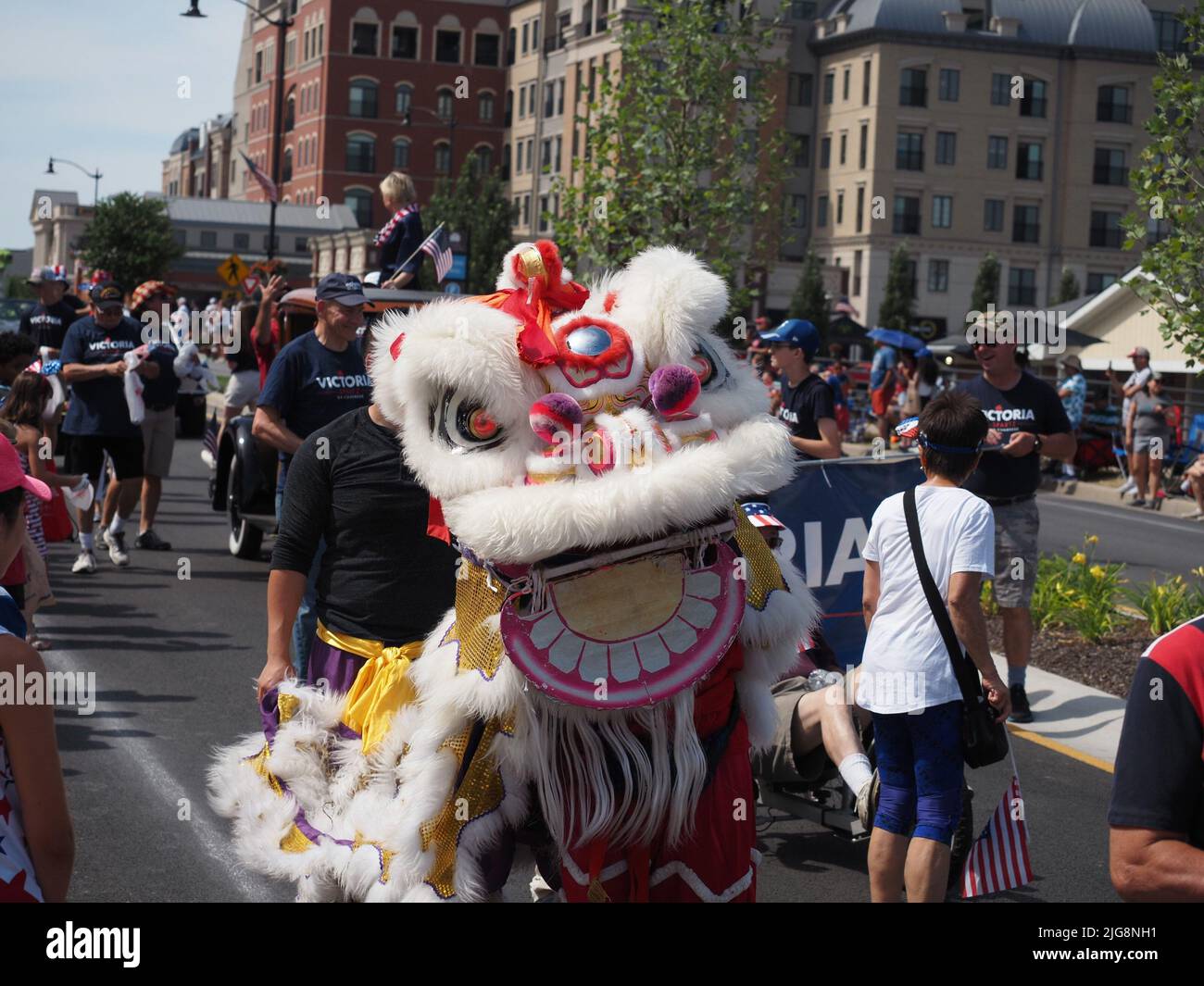 Chinese Dragon entertaining spectators in Parade. Selective focus and ...