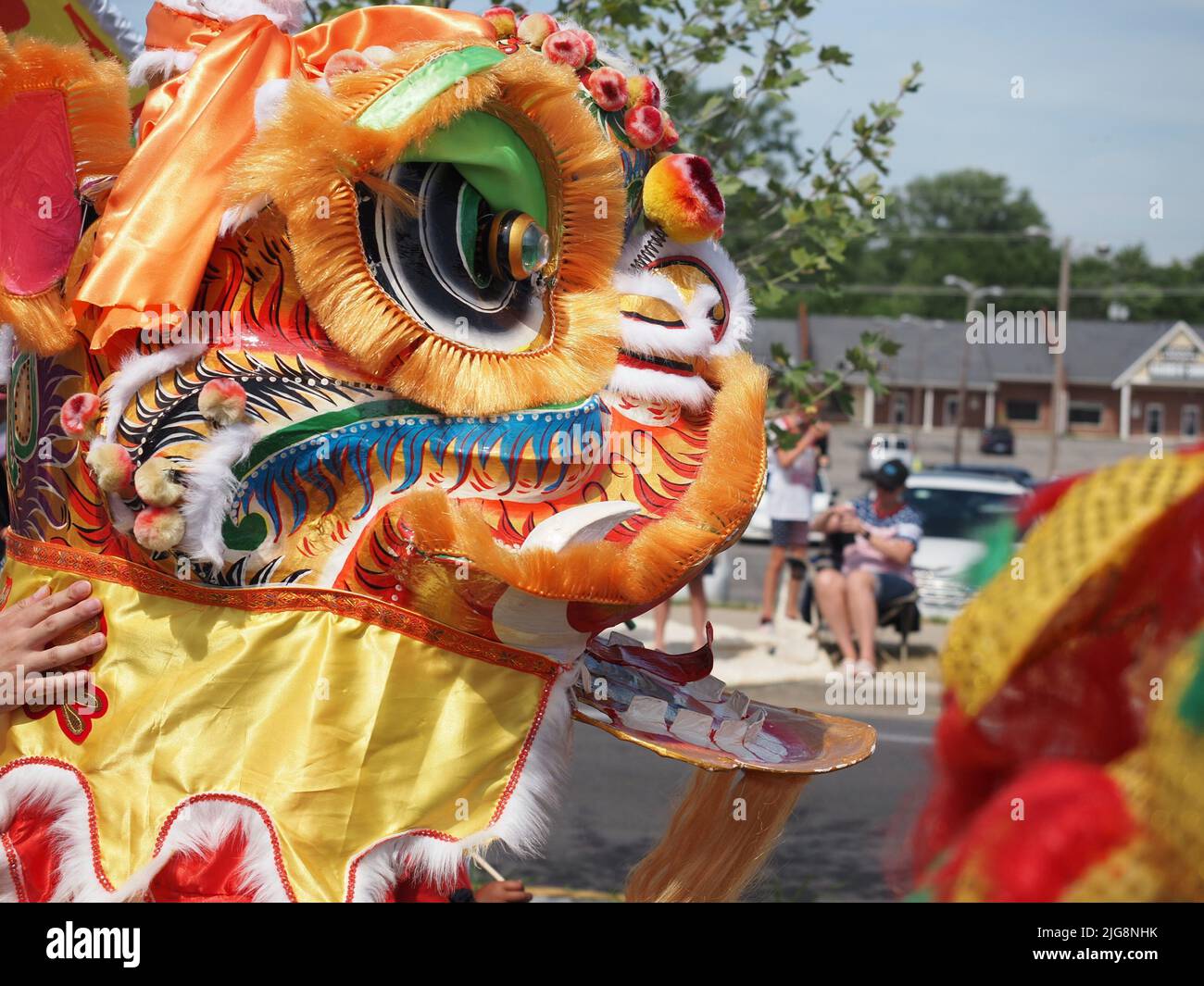 Chinese Dragon entertaining spectators in Parade. Selective focus and ...