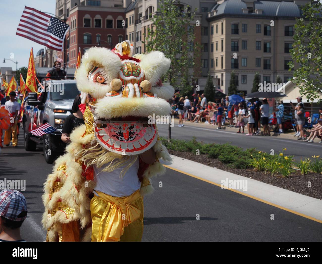 Chinese Dragon entertaining spectators in Parade. Selective focus and ...
