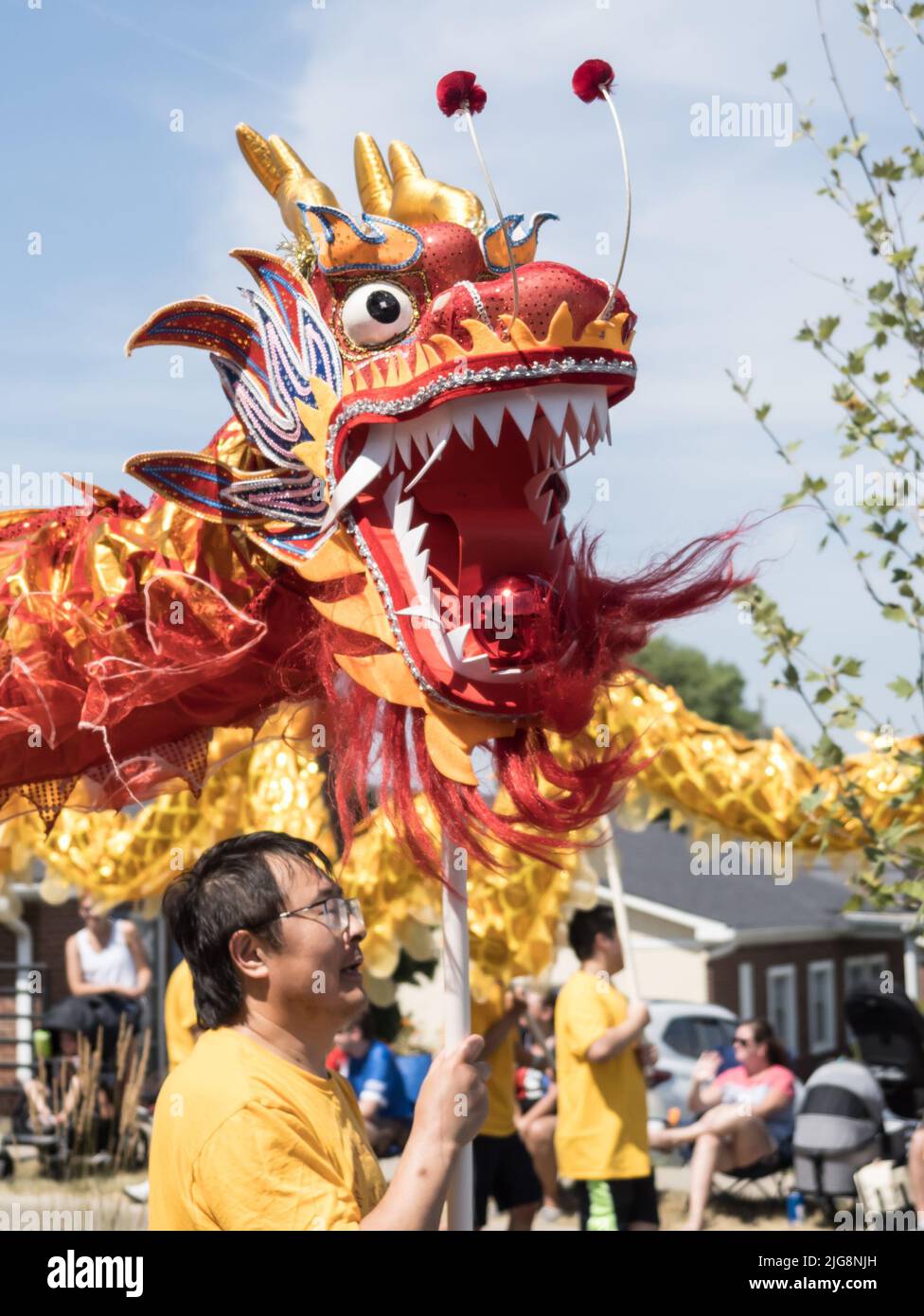 Chinese Dragon entertaining spectators in Parade. Selective focus and ...