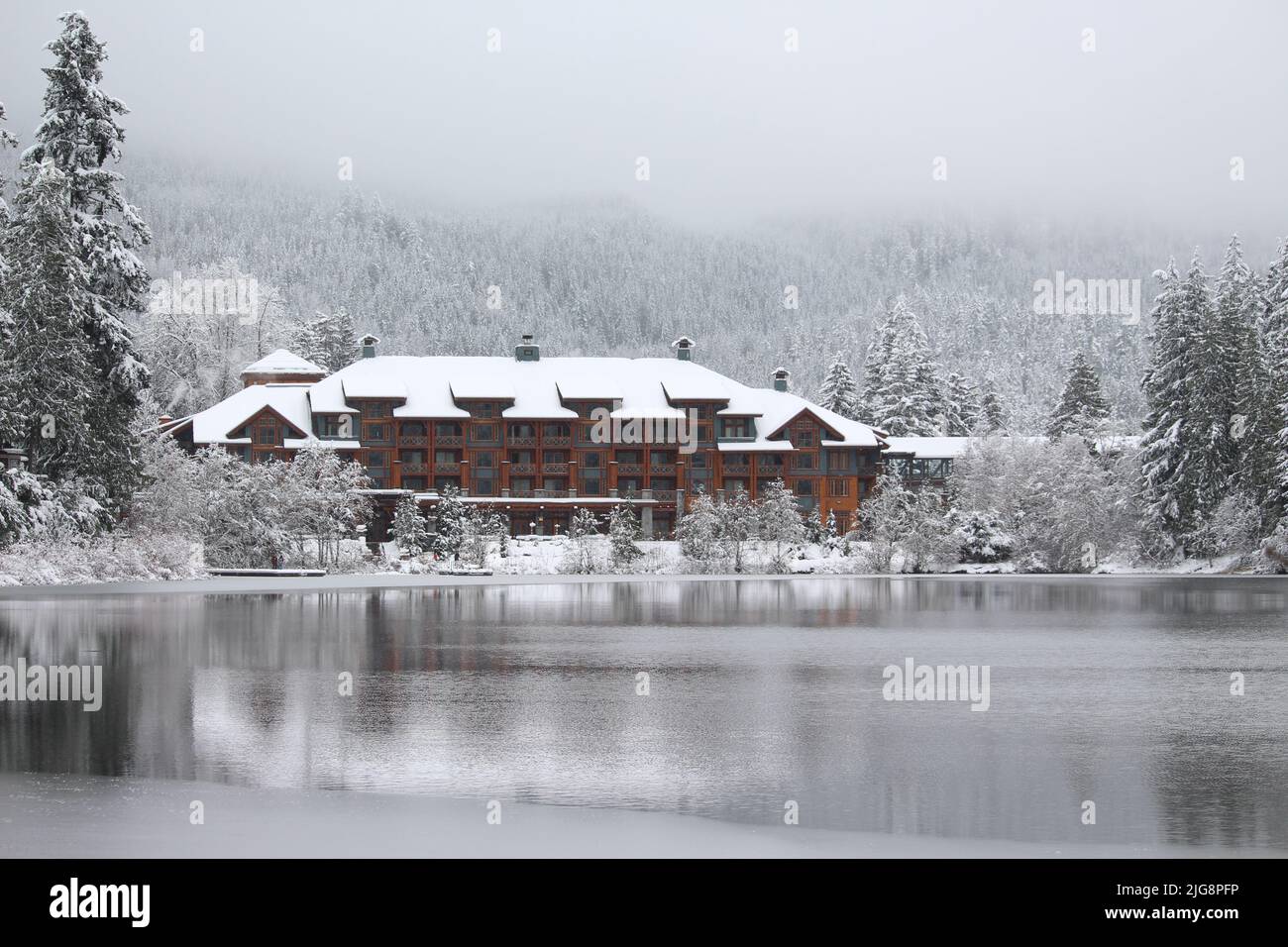 A low angle view of a modern building near the lake in winter Stock ...