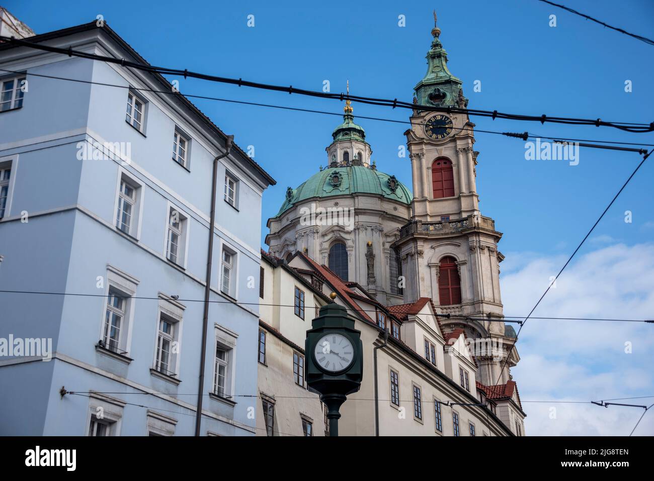 St. Nicholas Church, overhead streetcar lines, Prague, Czech Republic ...