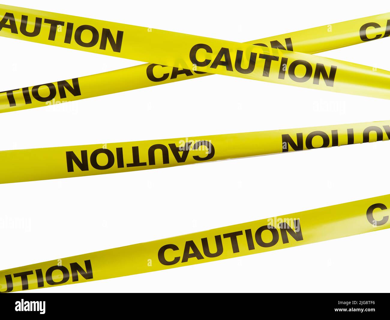 On a white background, a set of yellow restrictive tapes - caution ...
