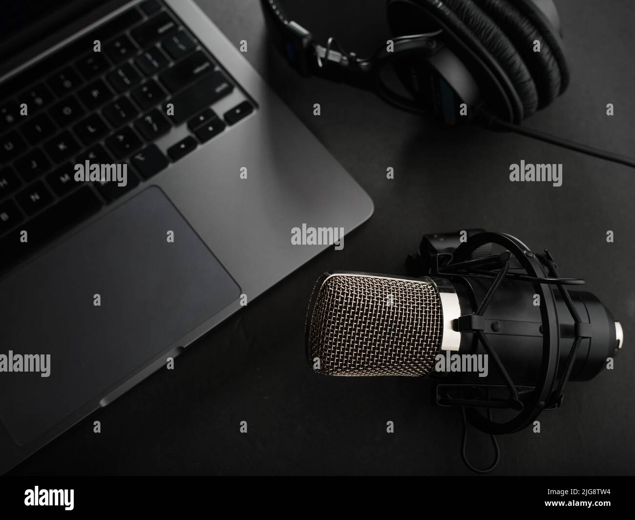 On a gray background, a professional studio microphone, studio ...