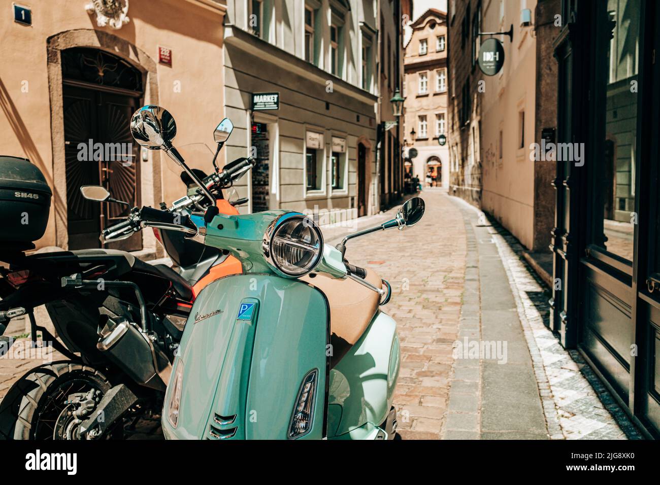 Prague, Czech Republic - July 2022. Retro Italian Vespa scooter in blue ...