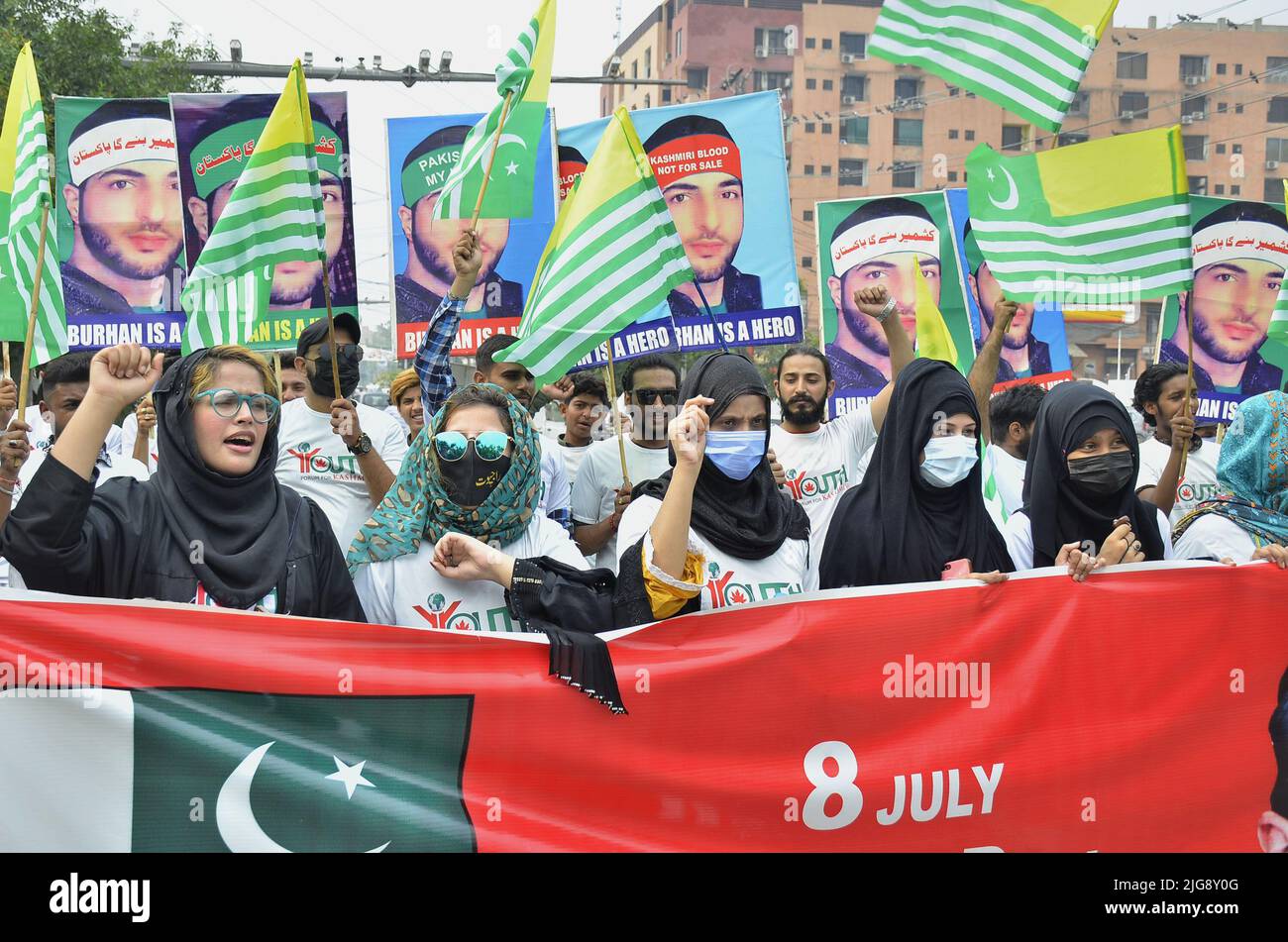 Pakistani activists of Youth Forum for Kashmir hold placards featuring ...