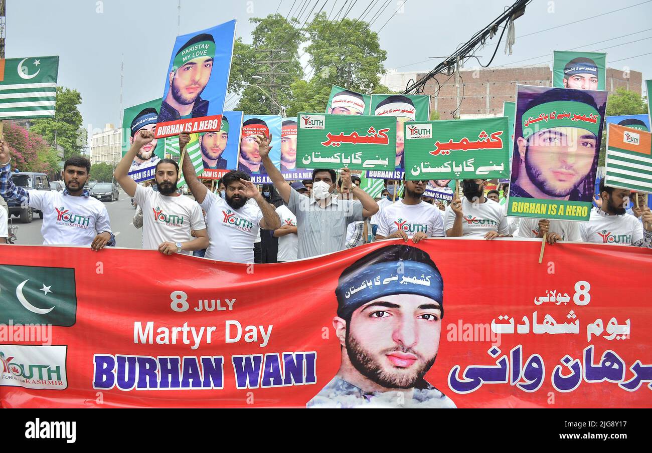 Pakistani activists of Youth Forum for Kashmir hold placards featuring ...