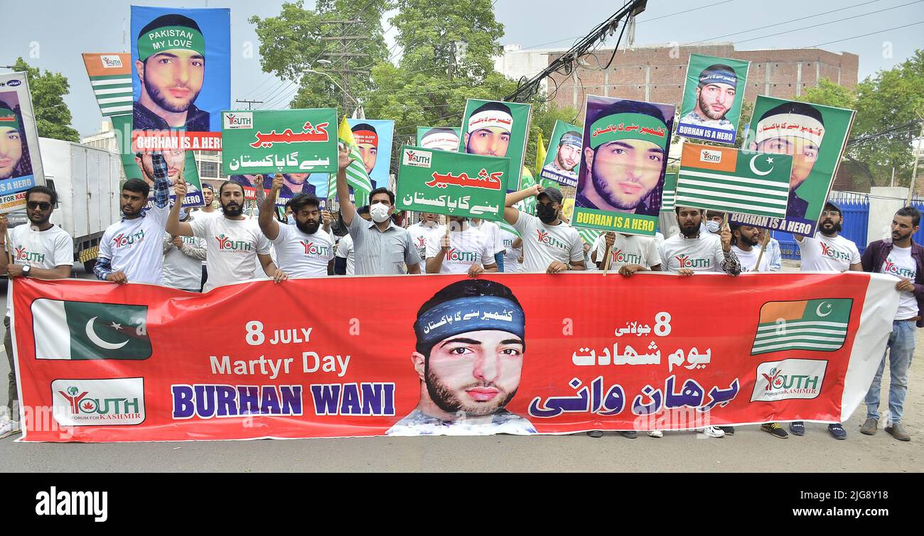 Pakistani activists of Youth Forum for Kashmir hold placards featuring ...