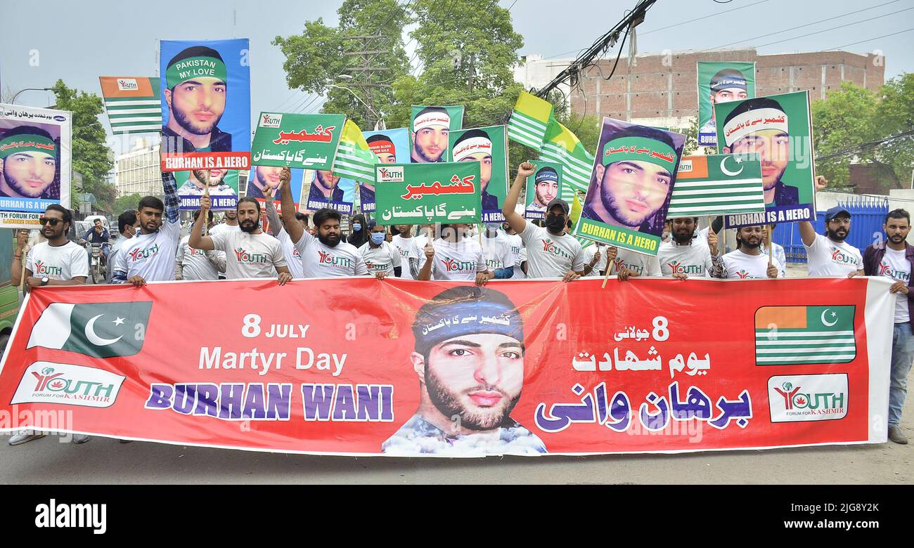 Pakistani activists of Youth Forum for Kashmir hold placards featuring ...