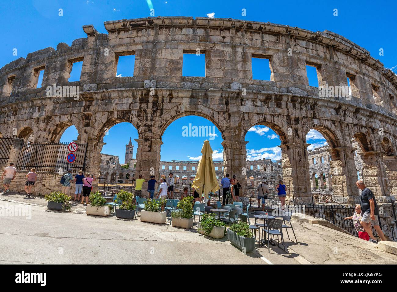 Tourists seen visiting the Pula Arena , Roman amphitheatre located in ...