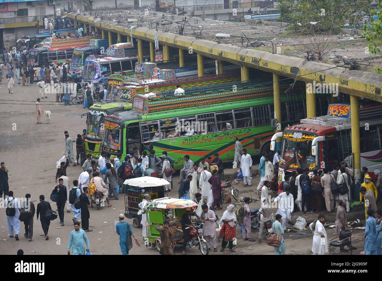 July 8, 2022, Lahore, Punjab, Pakistan: Pakistani people boarding roof ...