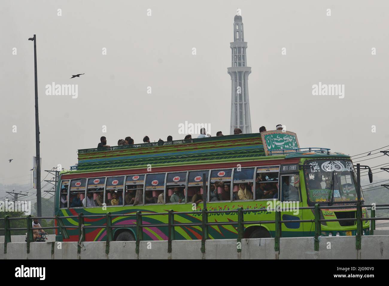 July 8, 2022, Lahore, Punjab, Pakistan: Pakistani people boarding roof ...