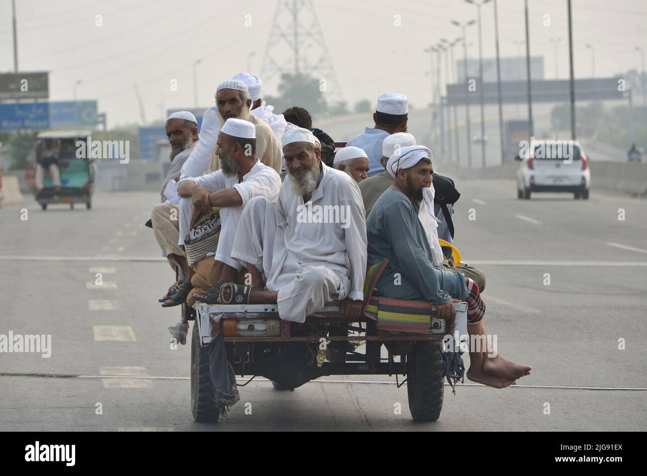 July 8, 2022, Lahore, Punjab, Pakistan: Pakistani people boarding roof ...