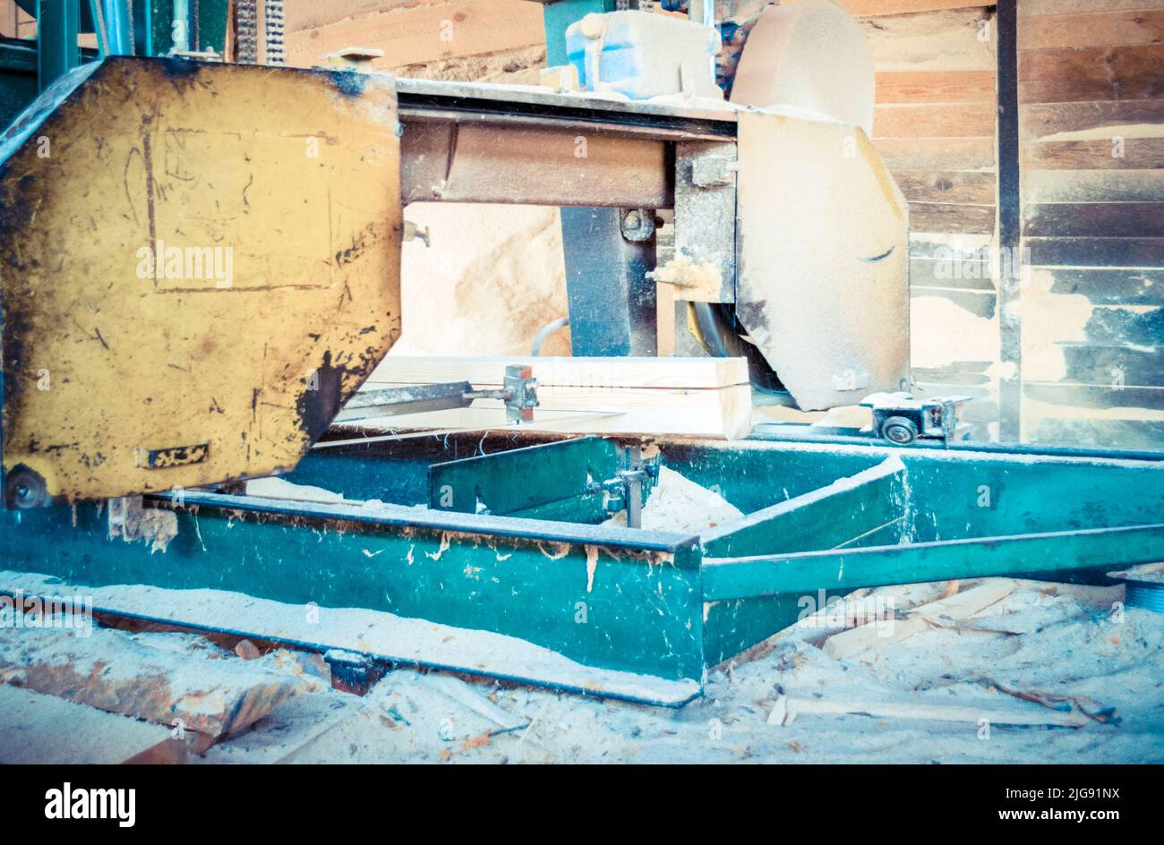 Sawmill. Process of machining logs in equipment sawmill machine saw ...