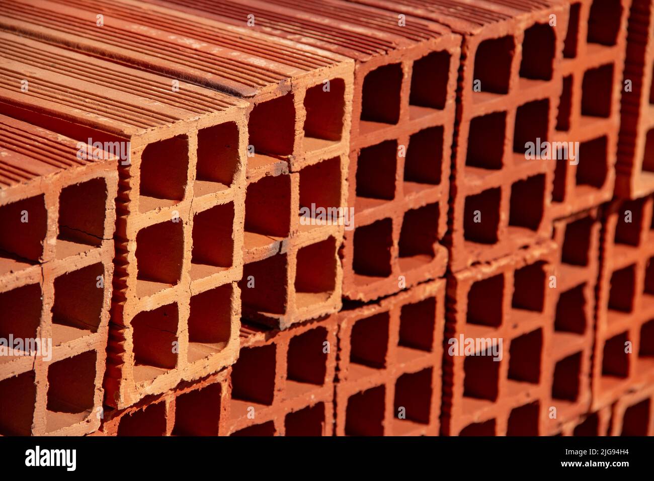 Red ceramic bricks hi-res stock photography and images - Alamy