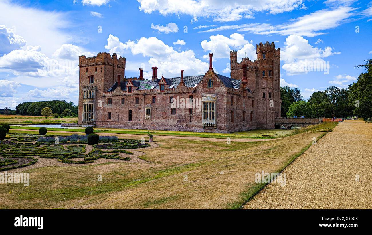 The Oxburgh Hall moated country house in Oxborough, Norfolk, England ...