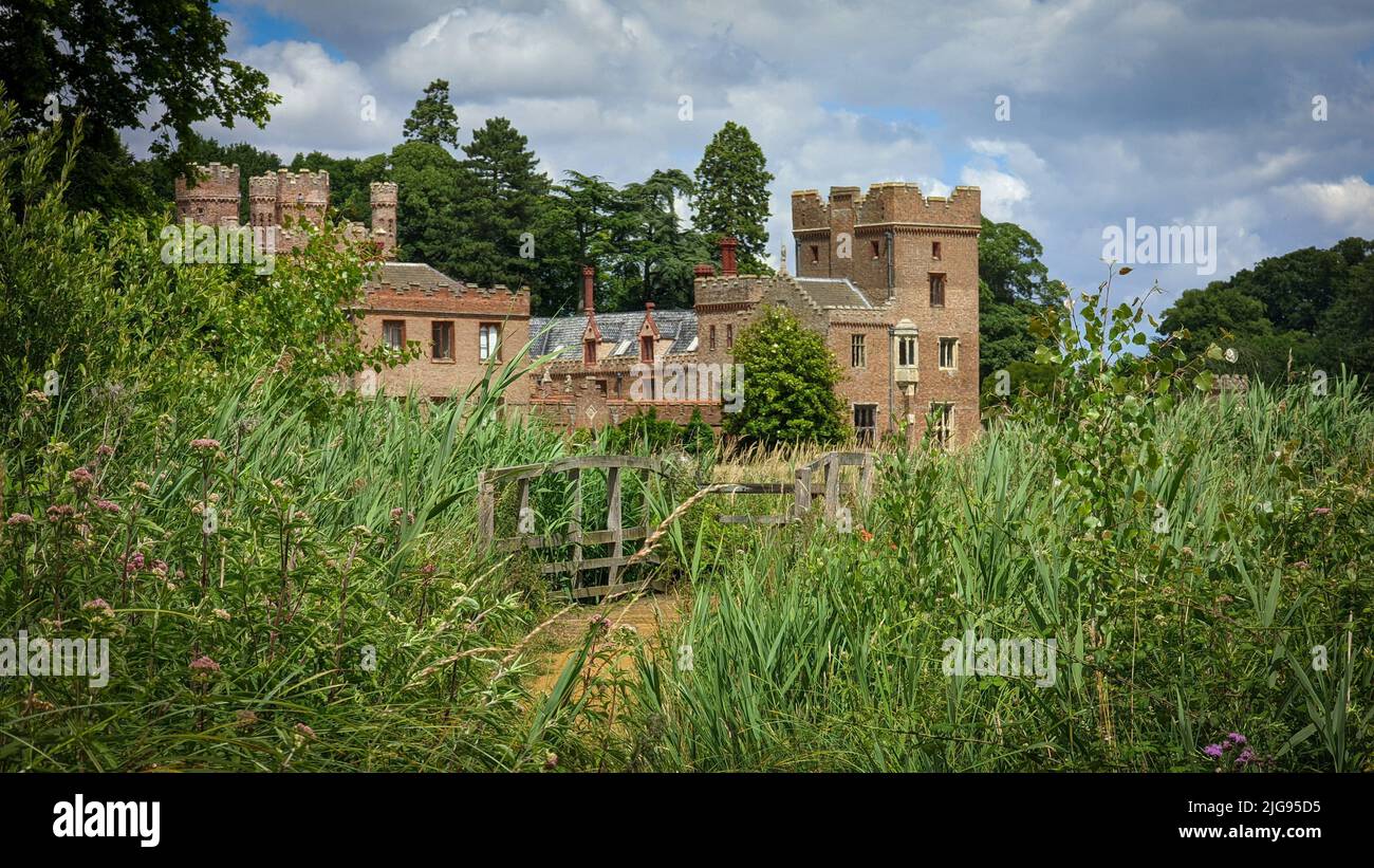 The Oxburgh Hall moated country house in Oxborough, Norfolk, England ...