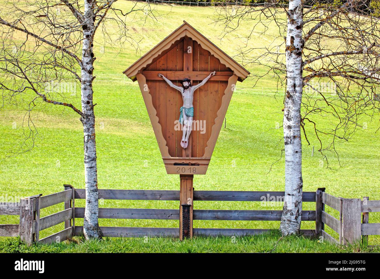 Wooden cross between two trees hi-res stock photography and images - Alamy