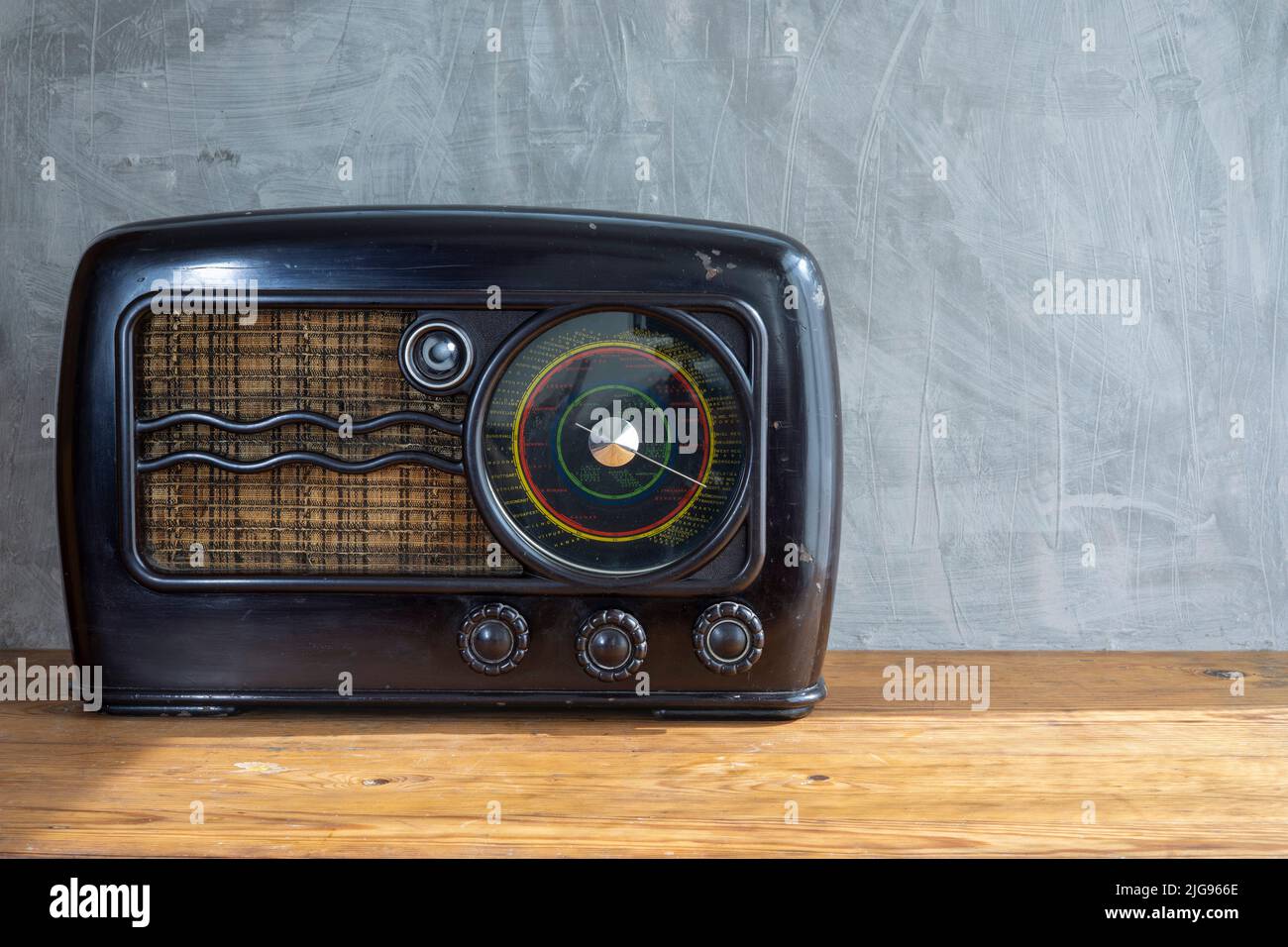 Old fashion style vintage radio over retro background with copyspace ...