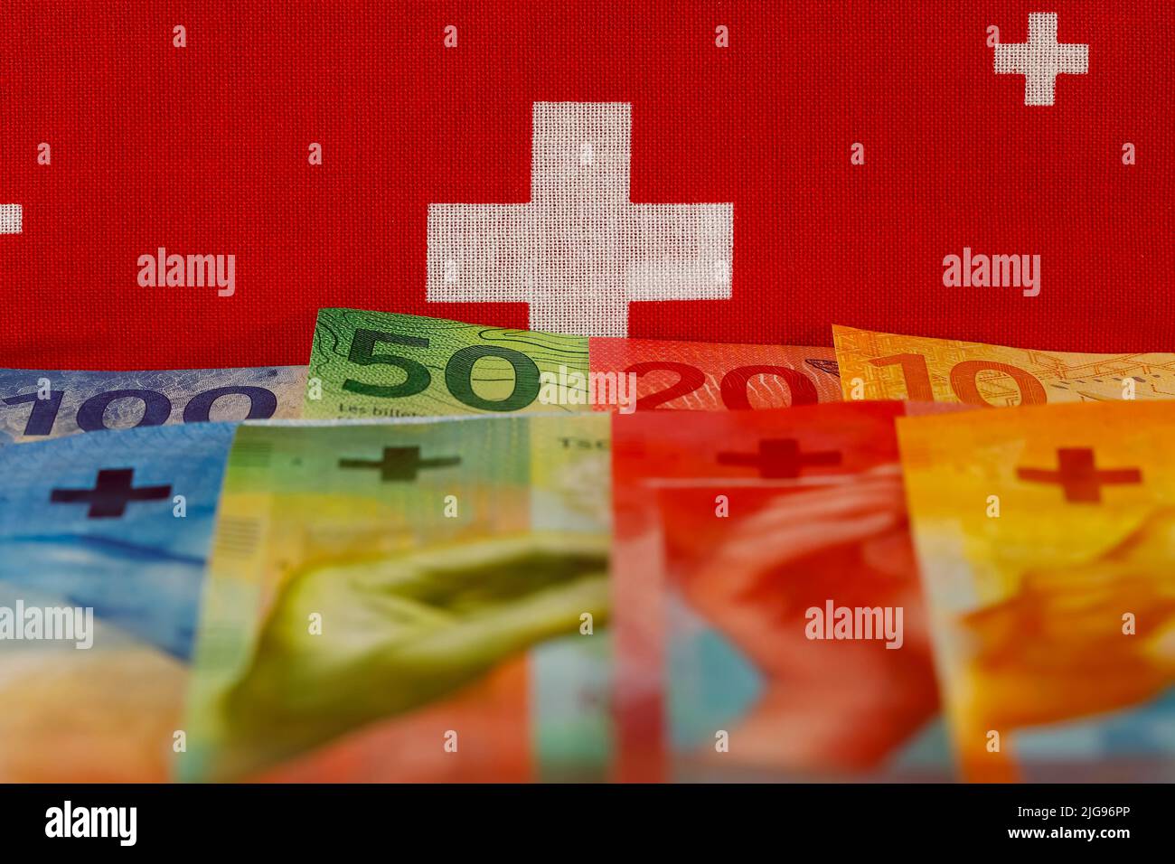 The new Swiss currency of various denominations is shown here with the ...